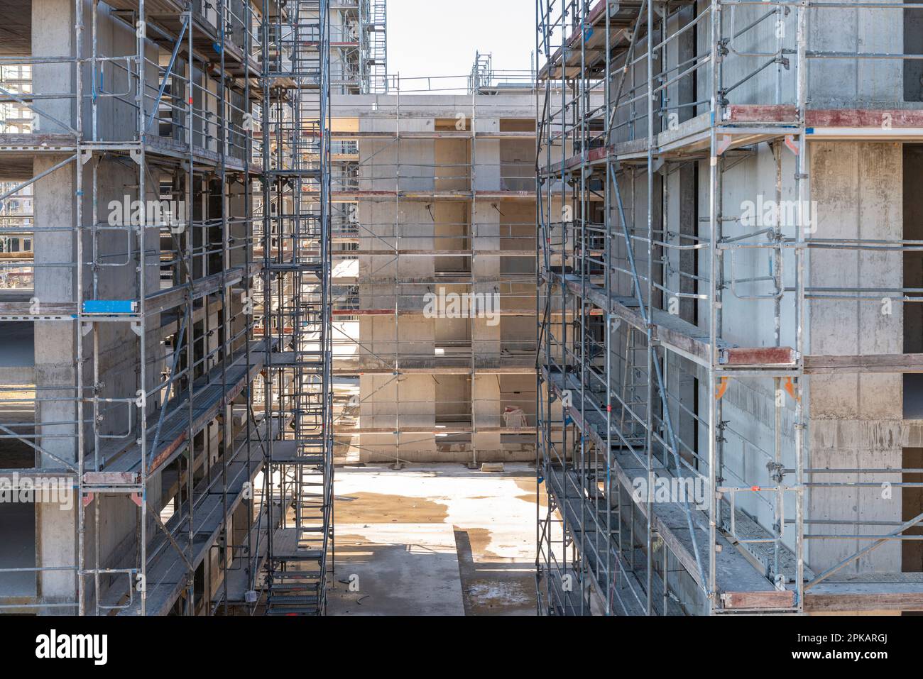 Detail of facade of scaffolded multi-storey building in shell with ...