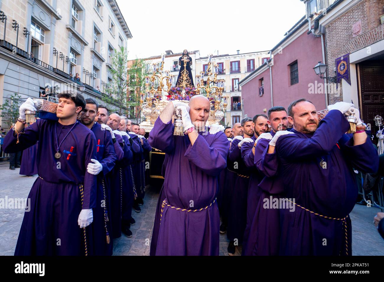 Costaleros carry the canopy of Jesus the Poor in the Holy Thursday ...