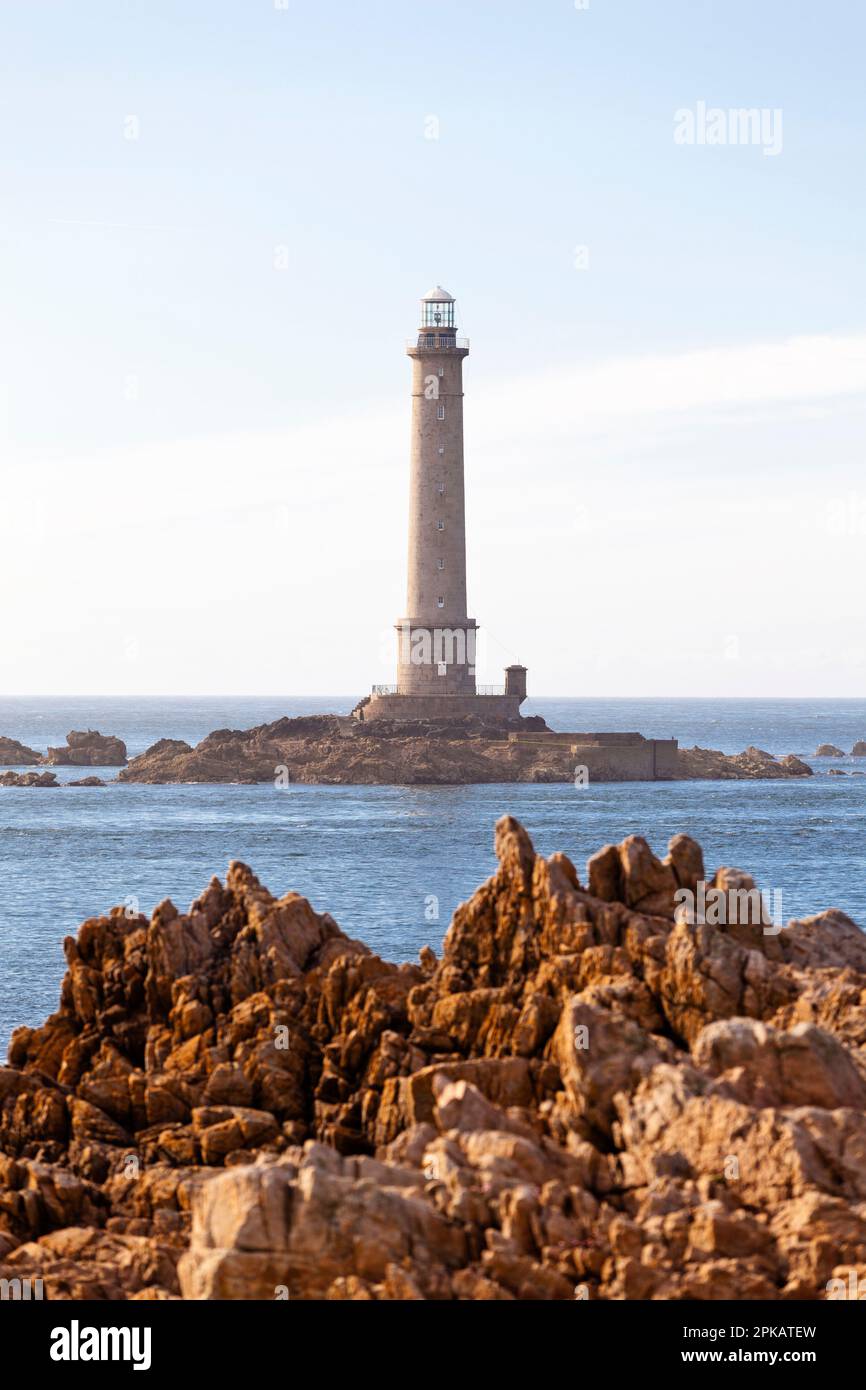Goury lighthouse on the rocky coast of the Cotentin Peninsula, Normandy ...