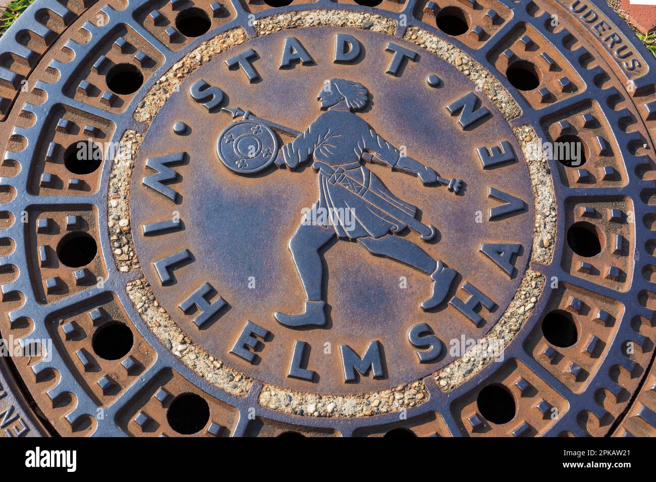 Manhole cover with wilhelmshaven city coat of arms hi-res stock ...