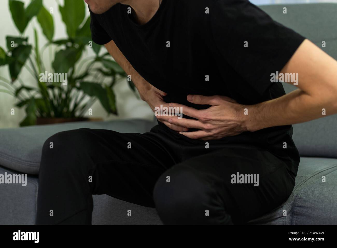 African american man suffering stomach hi-res stock photography and ...