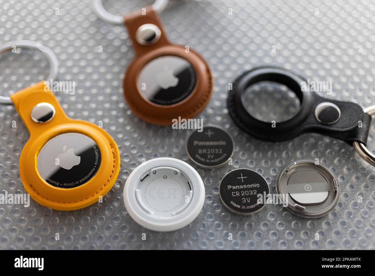 Three AirTag keychain, Apple AirTag open, button cell CR2032 icon photo ...