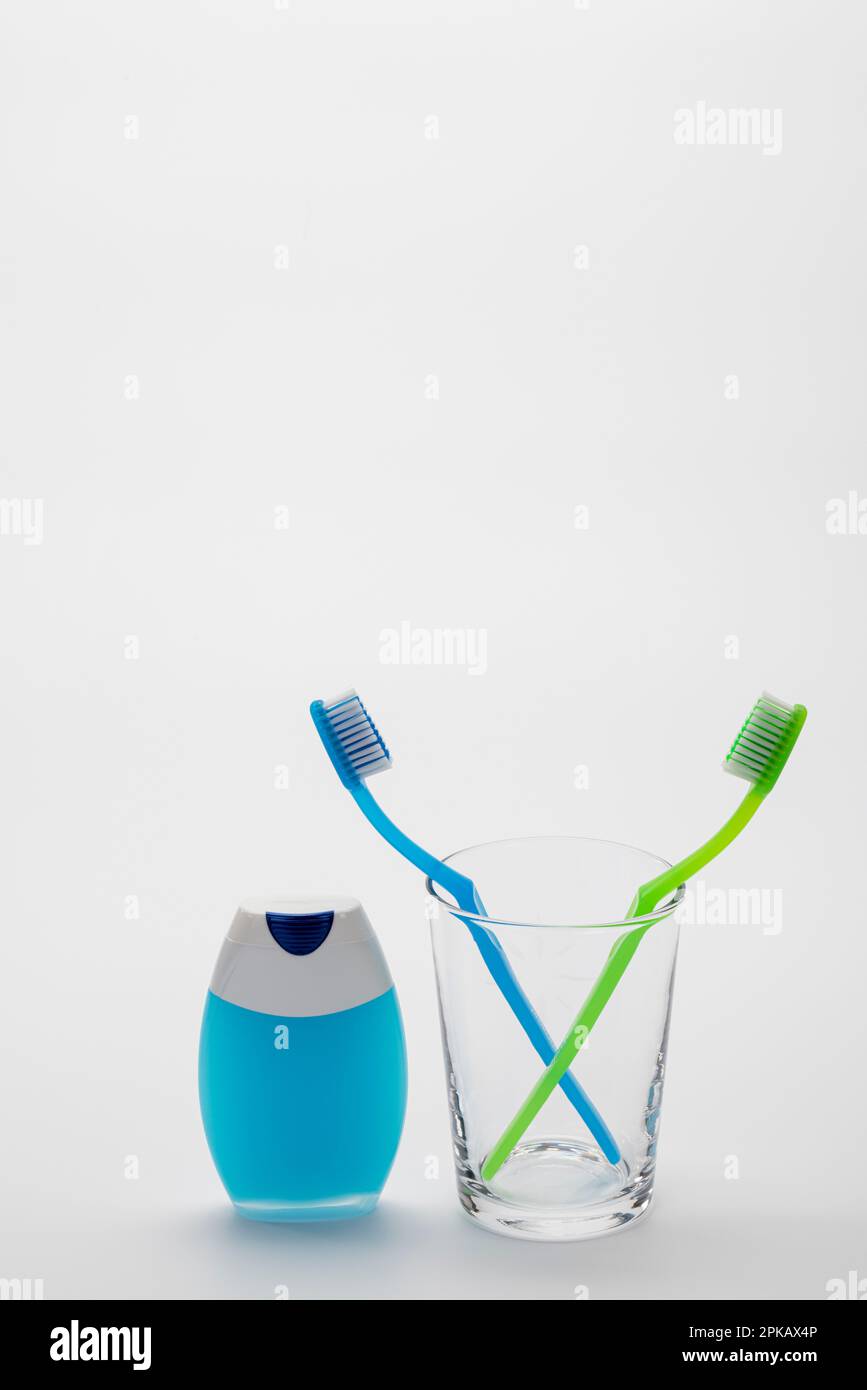 Mouth rinse, two toothbrushes in toothbrush cup, symbol image, teeth ...