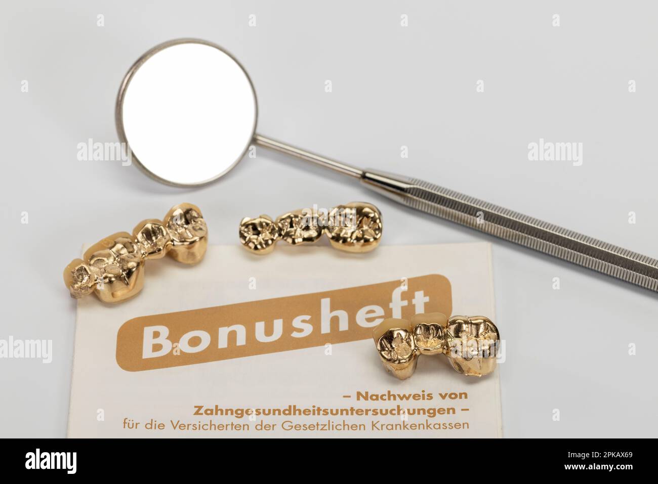 Bonus booklet, three used partially veneered dental bridges, mouth ...