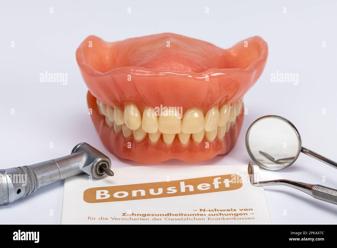 Denture, bonus book, dental drill, mouth mirror, dental probe, symbol ...