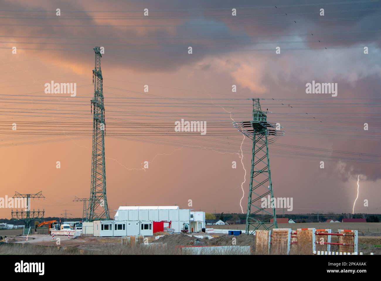 Thunderstorm cell, lightning over construction container of the ...