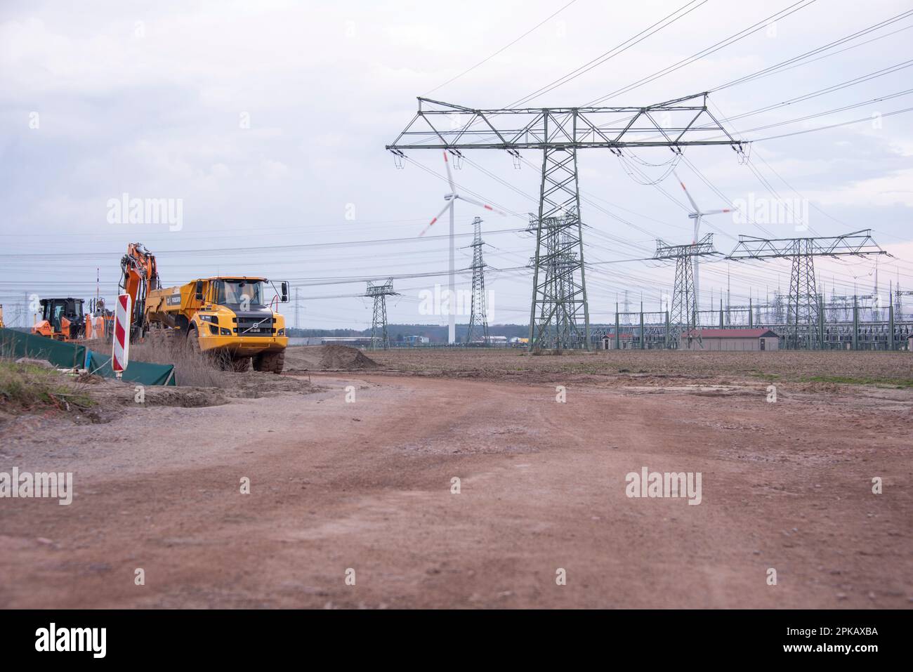 Power pylons, construction machinery, Southeast Link construction site ...