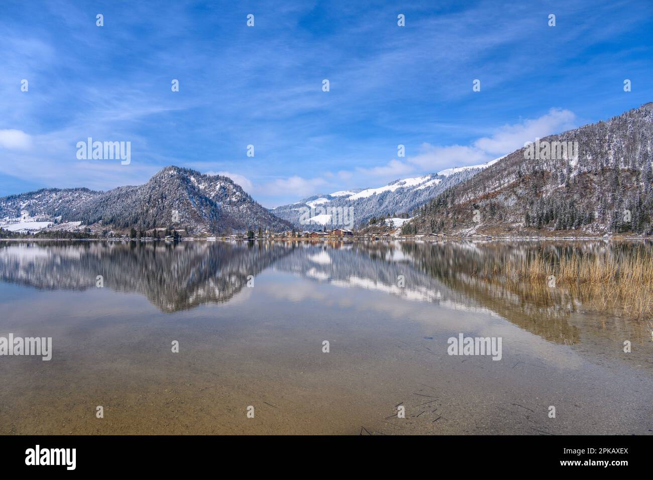 Austria, Tyrol, Kaiserwinkl, Walchsee, Walchsee with village view ...