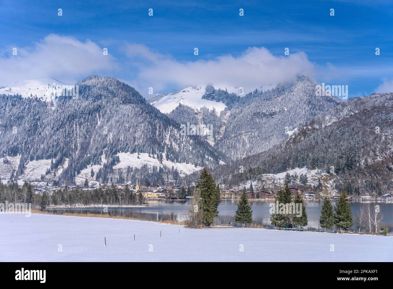 Austria, Tyrol, Kaiserwinkl, Walchsee, Walchsee with village view ...