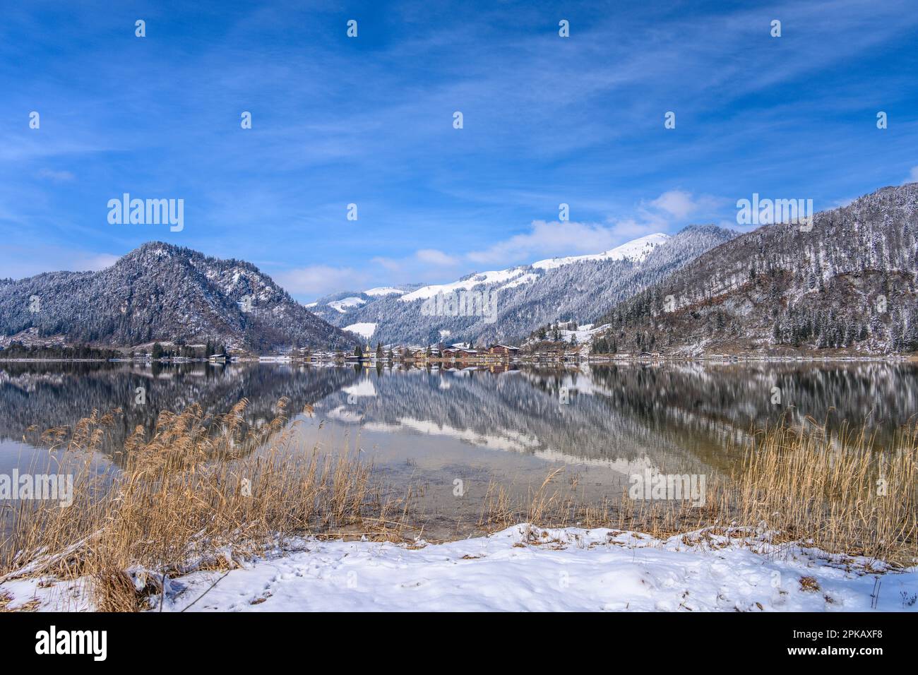 Austria, Tyrol, Kaiserwinkl, Walchsee, Walchsee with village view ...