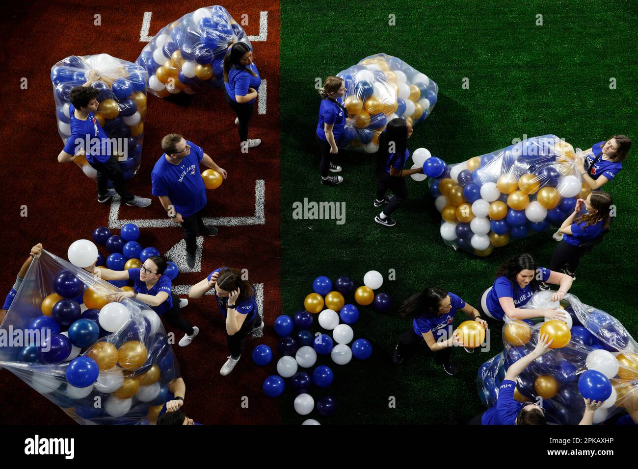 Toronto, Canada. 06th Apr, 2023. Workers clean up balloons in the newly ...