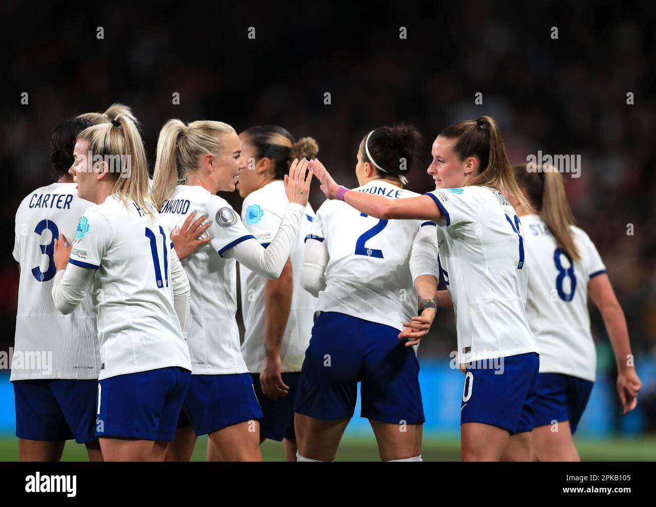 England's Ella Toone (right) celebrates scoring their side's first goal ...