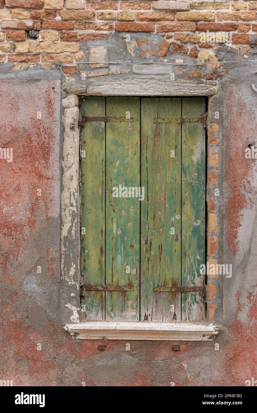 Burano island shutters. Colourful shutters on the island of Murano near ...