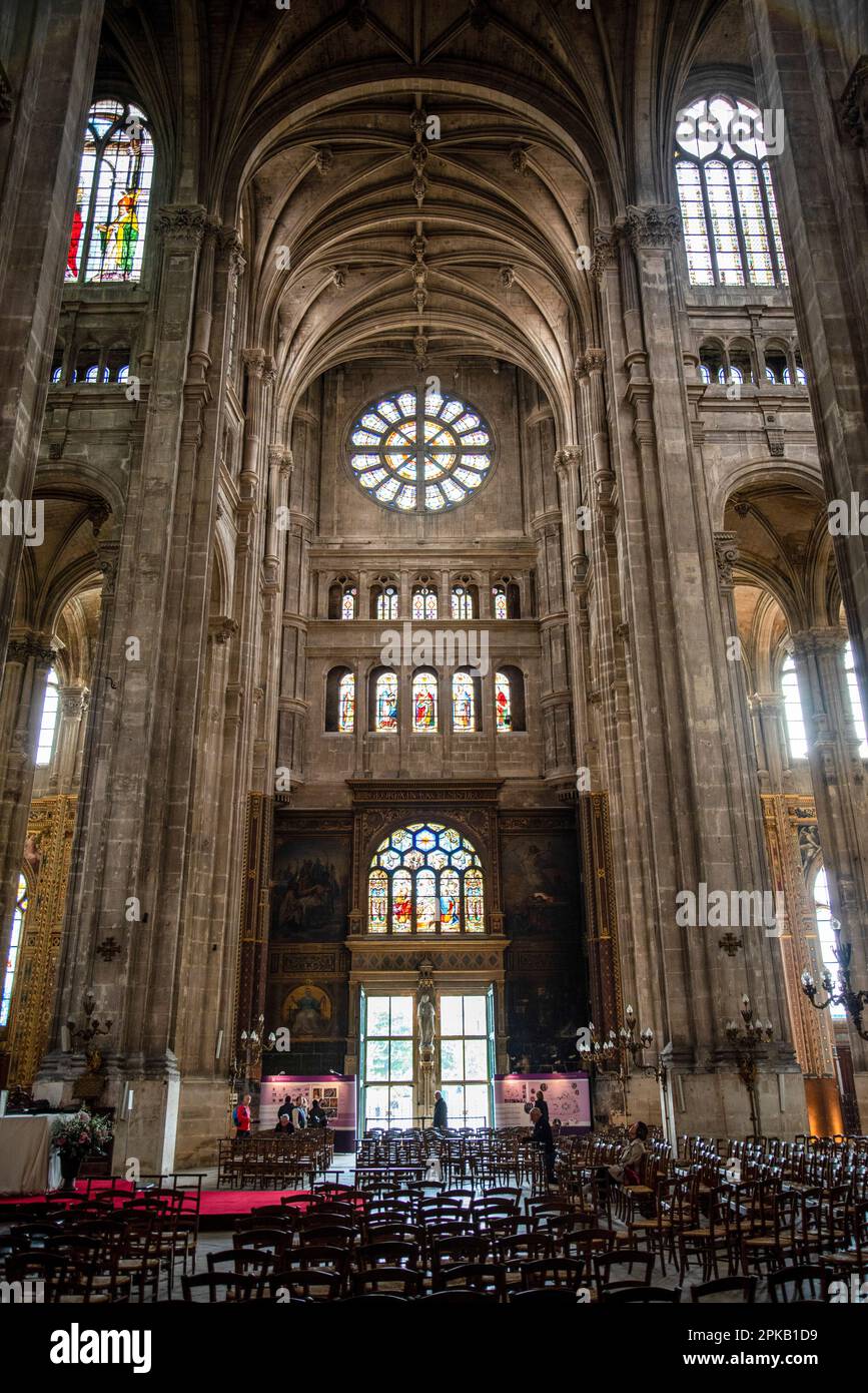 Tall columns and beautifully ornate ceiling in the gothic church Saint ...