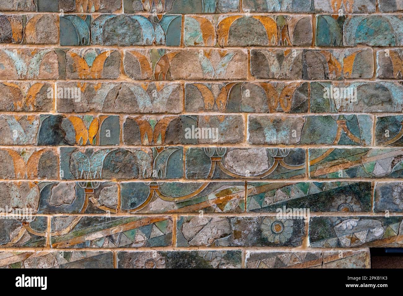 Colorful ancient Persian wall frieze in the Louvre museum in Paris ...