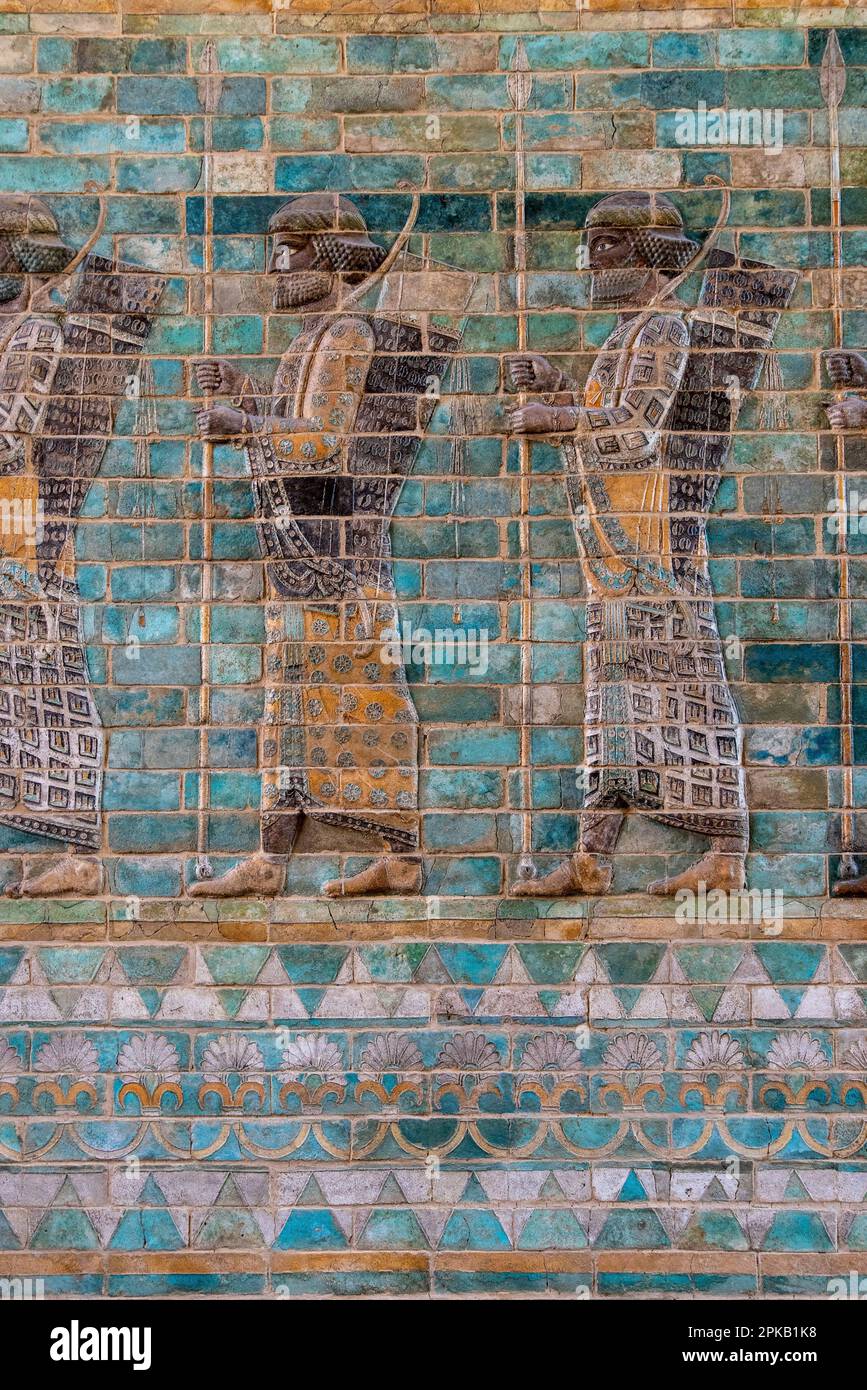 Colorful ancient Persian wall frieze in the Louvre museum in Paris ...