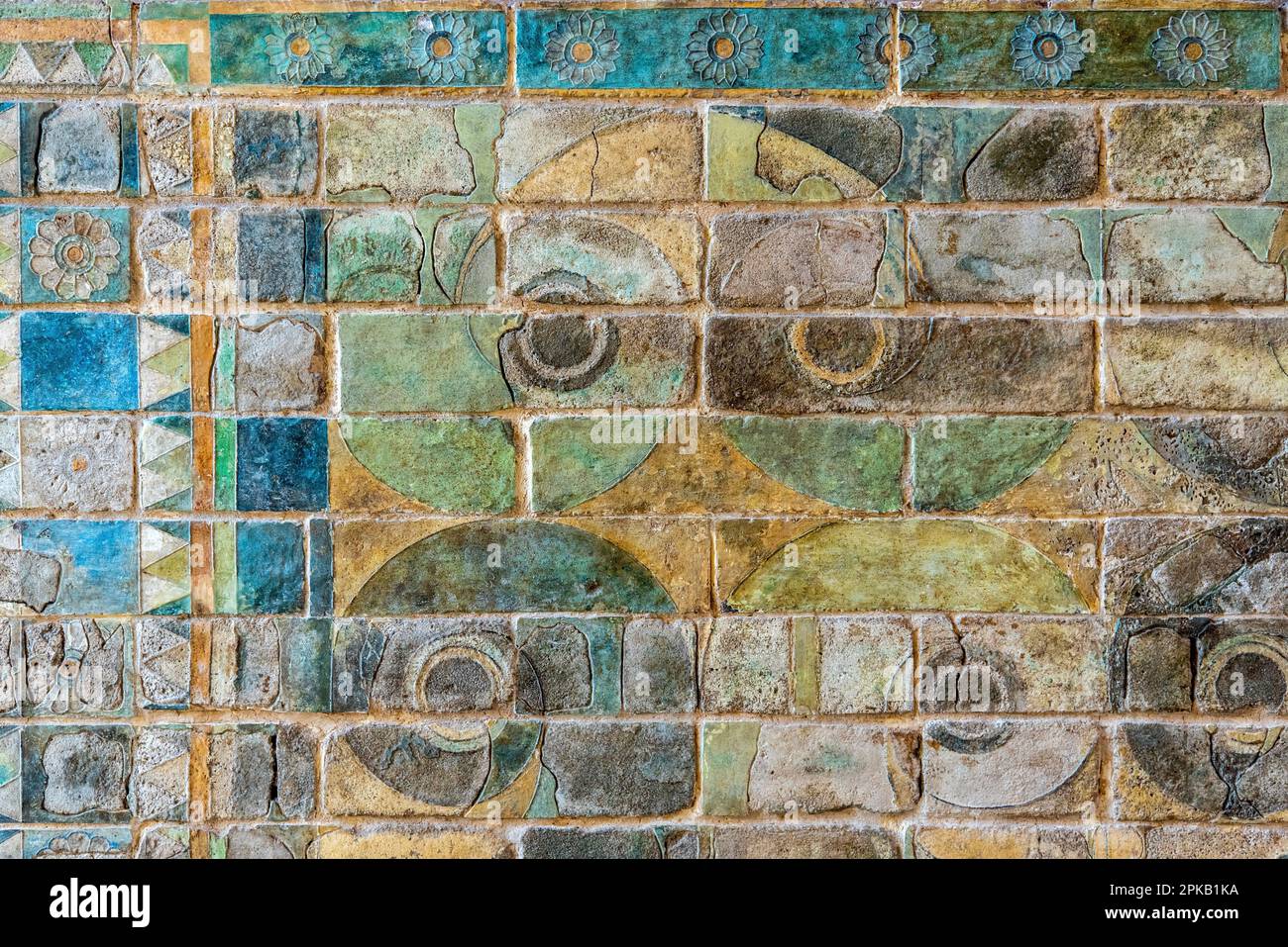 Colorful ancient Persian wall frieze in the Louvre museum in Paris ...