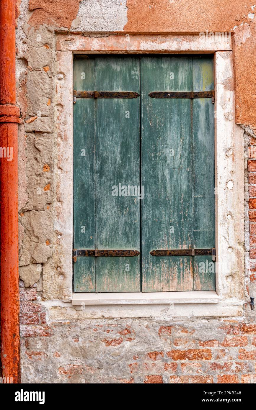 Burano island shutters. Colourful shutters on the island of Murano near ...