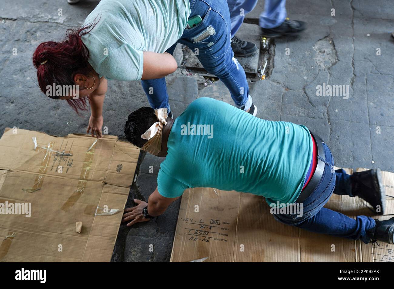 Victor Martinez, 30, a penitent, crawls blindfolded to the El Calvario ...