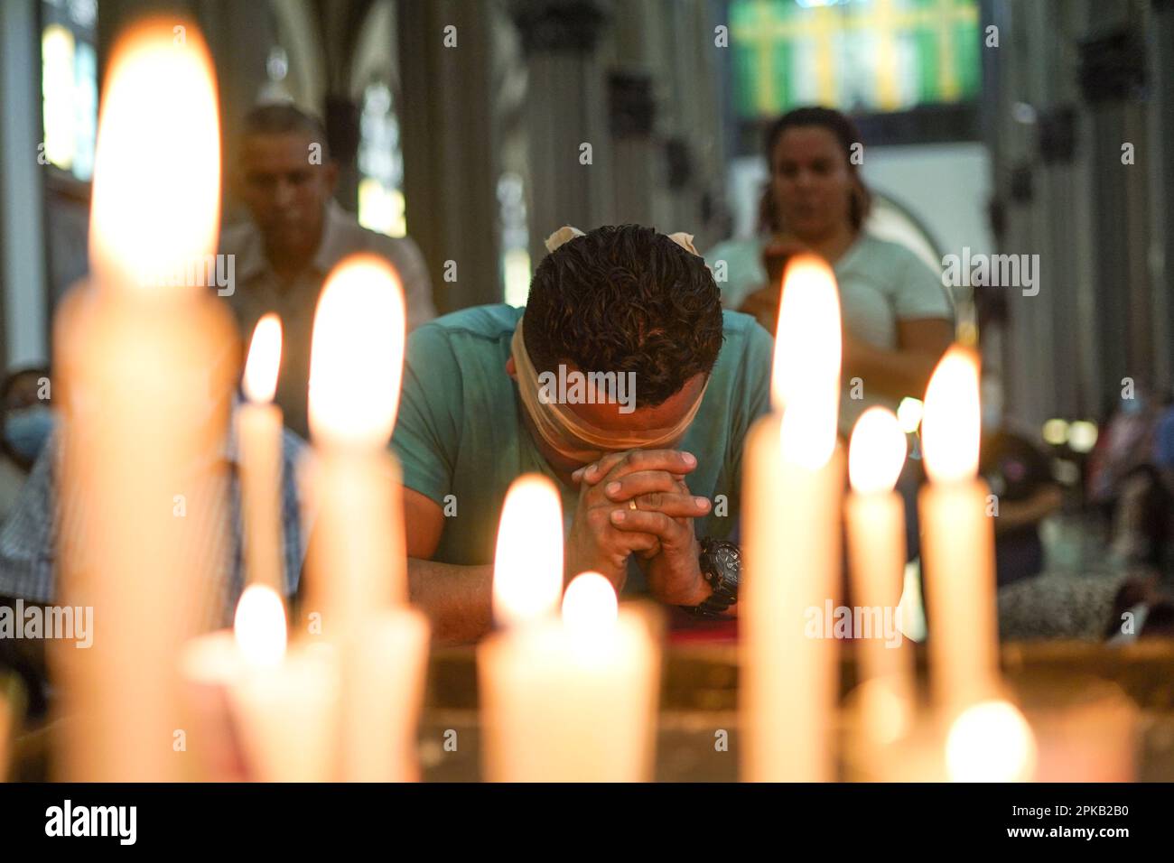 Victor Martinez, 30, a penitent, praying while blindfolded in the El ...