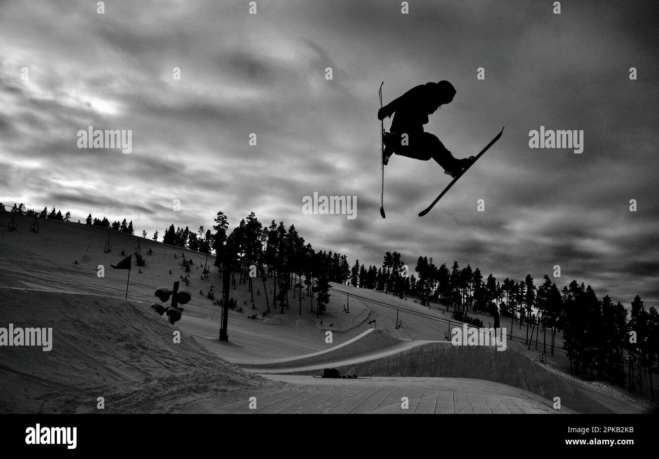Skier shot in a Split Grab position Stock Photo - Alamy