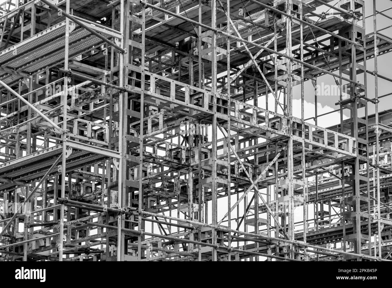 Black and white metal scaffolding structure on construction site ...