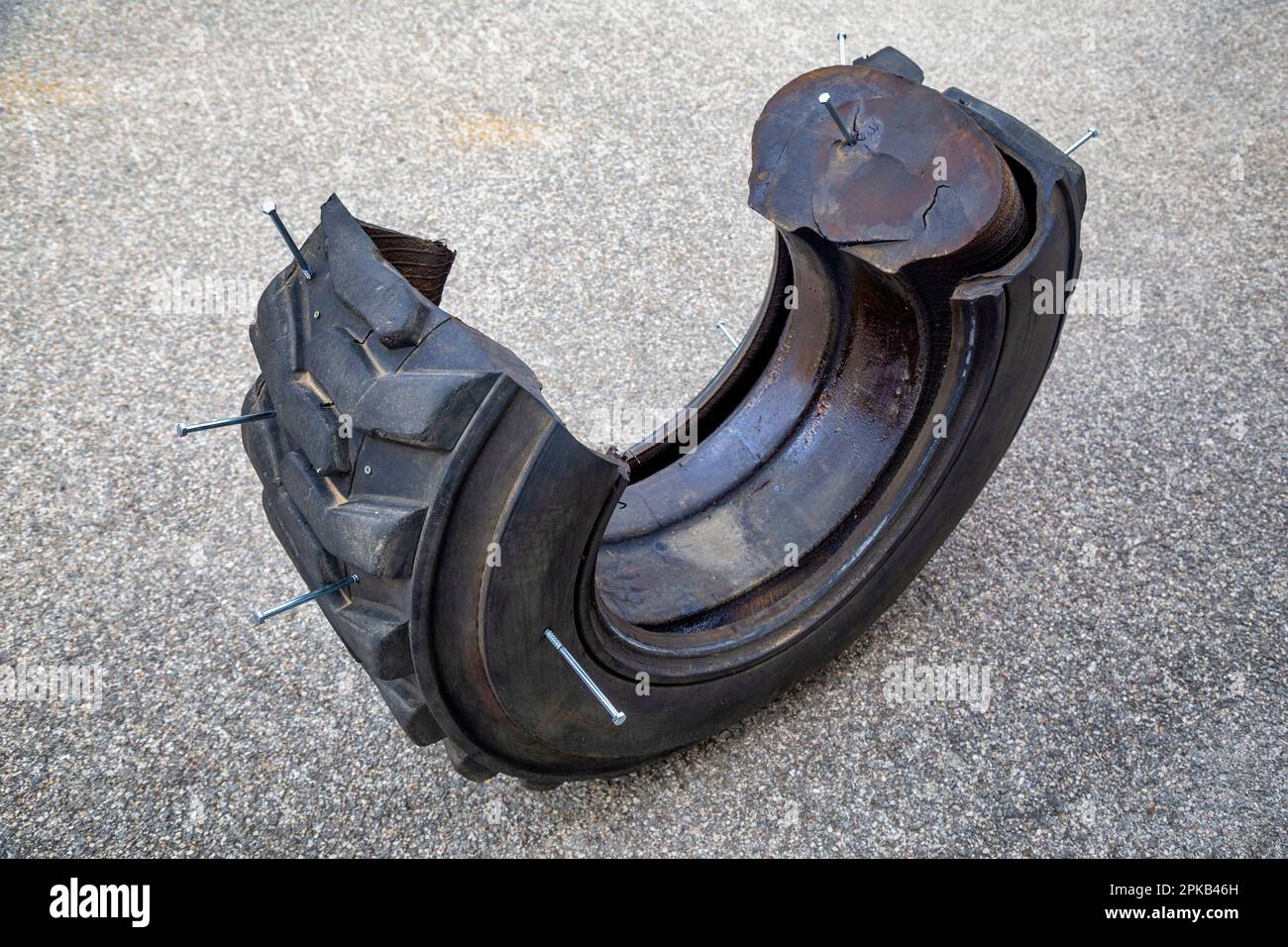 Cutaway model of run flat tire with sticking screw Stock Photo - Alamy