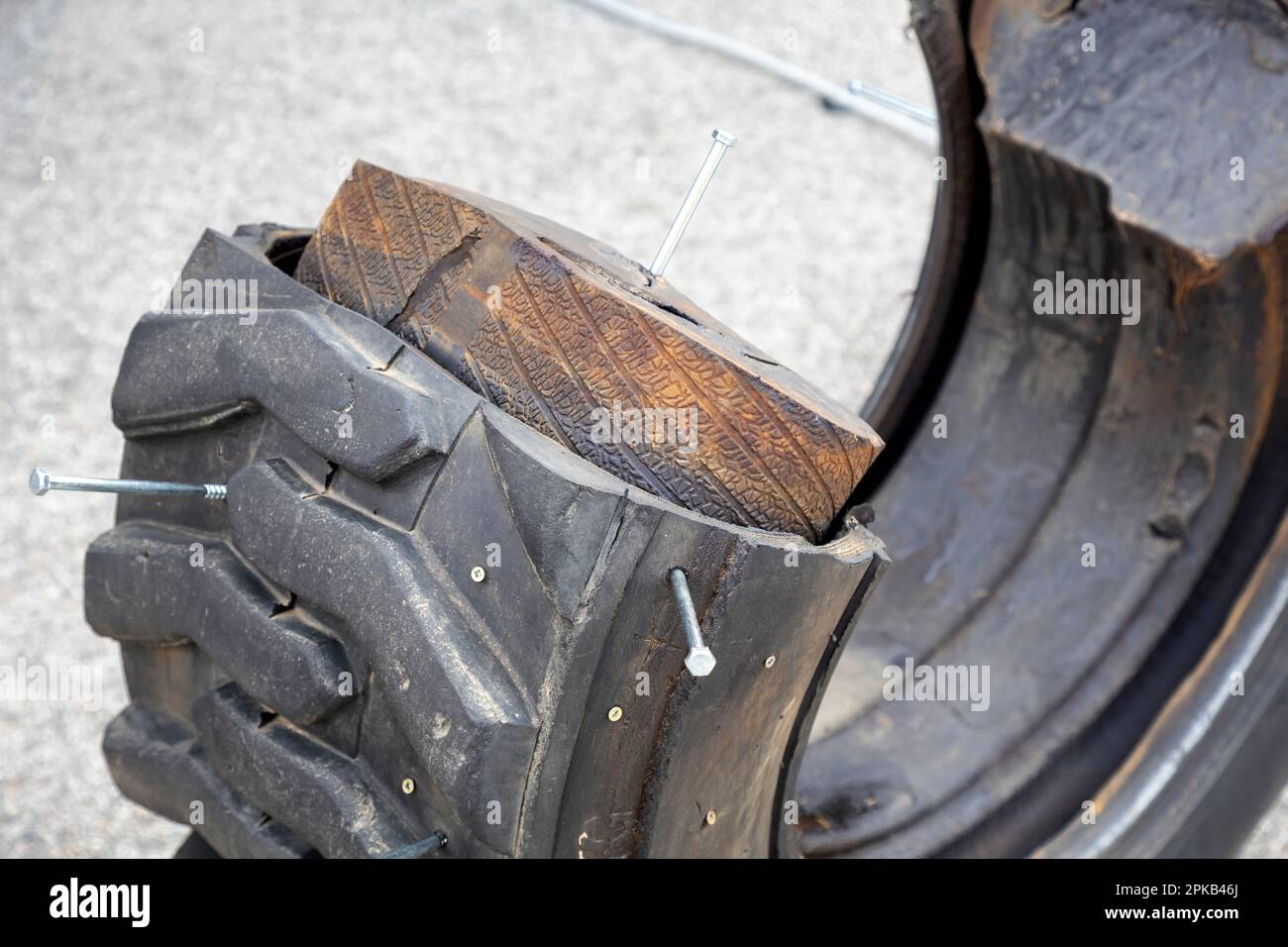 Cut-out view of run flat tire with sticking screw Stock Photo - Alamy
