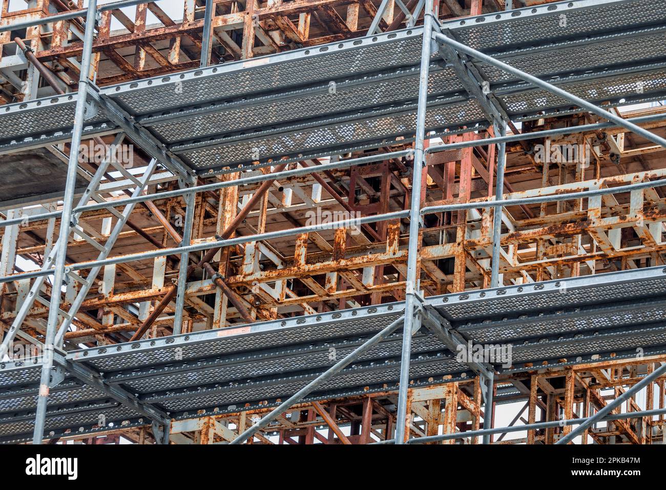 Metal scaffolding structure background on construction site. Abstract ...