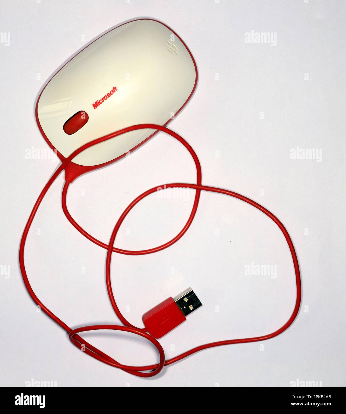 Microsoft red and white computer usb mouse Stock Photo - Alamy
