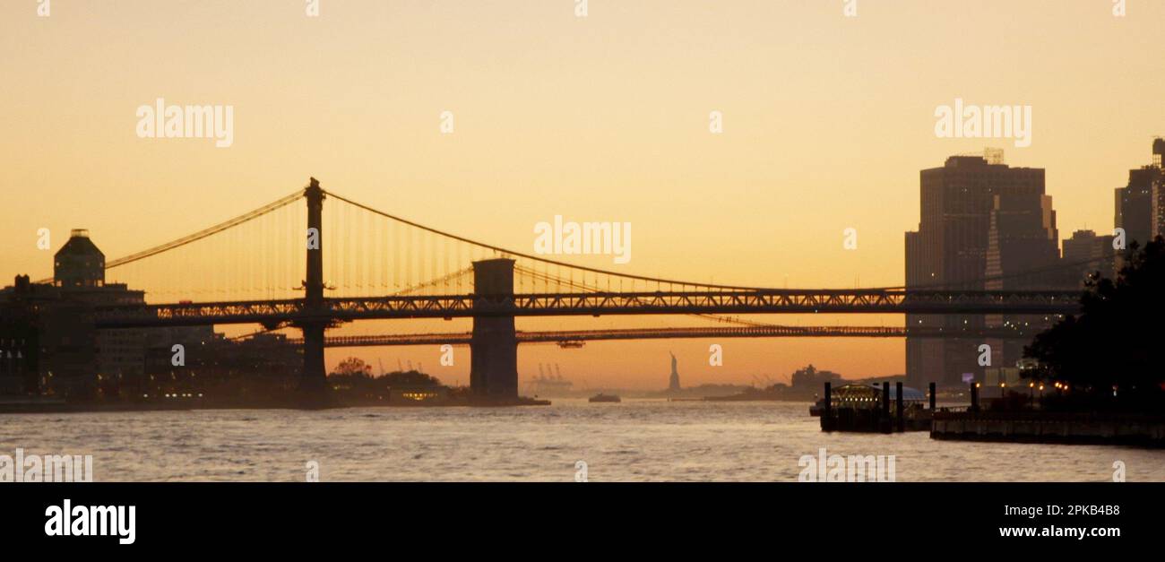 GOTHAM: THE FALL AND RISE OF NEW YORK, Manhattan Bridge with Statue of ...