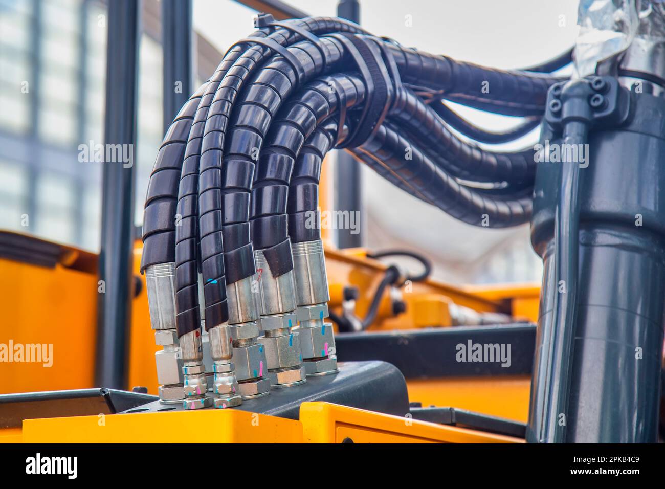 Hydraulic system of heavy industry machine. Pipes and hoses of ...