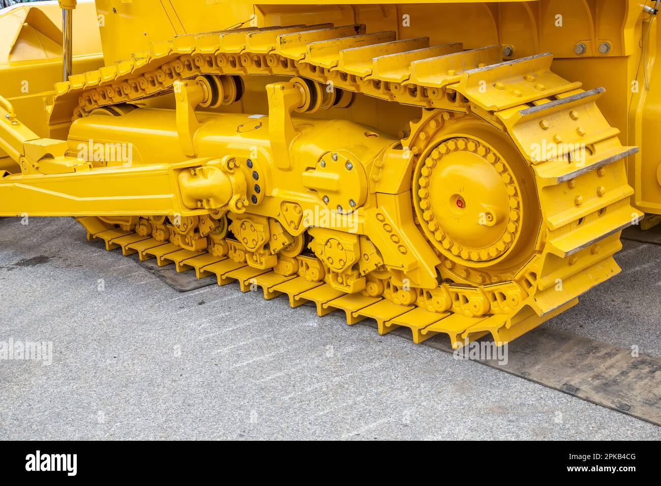 Continuous metal tracks of the bulldozer, yellow caterpillar Stock ...