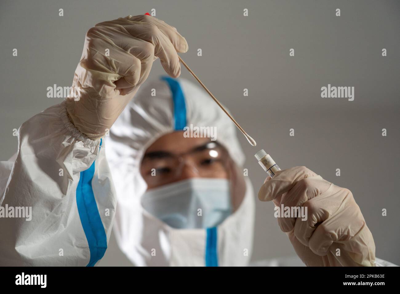 Medical personnel performing an antigen test for covid-19 Stock Photo ...