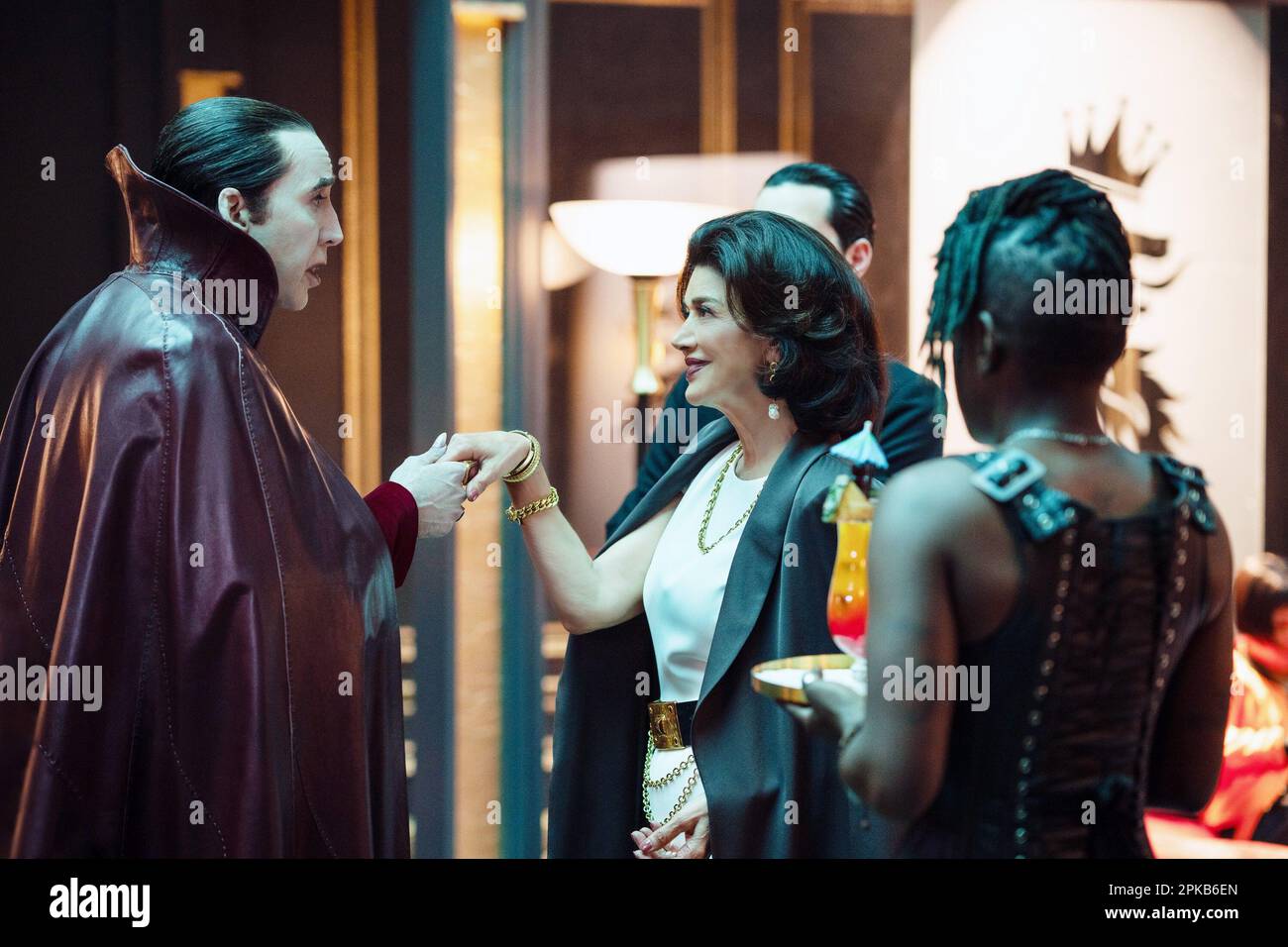RENFIELD, back, from left: Nicolas Cage as Dracula, Shohreh Aghdashloo ...