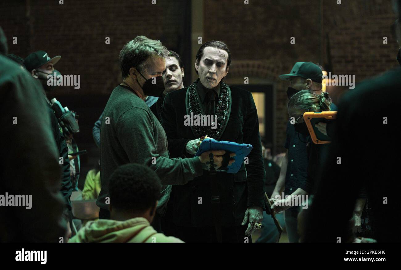 RENFIELD, from left: director Chris McKay, Nicolas Cage, on set, 2023 ...