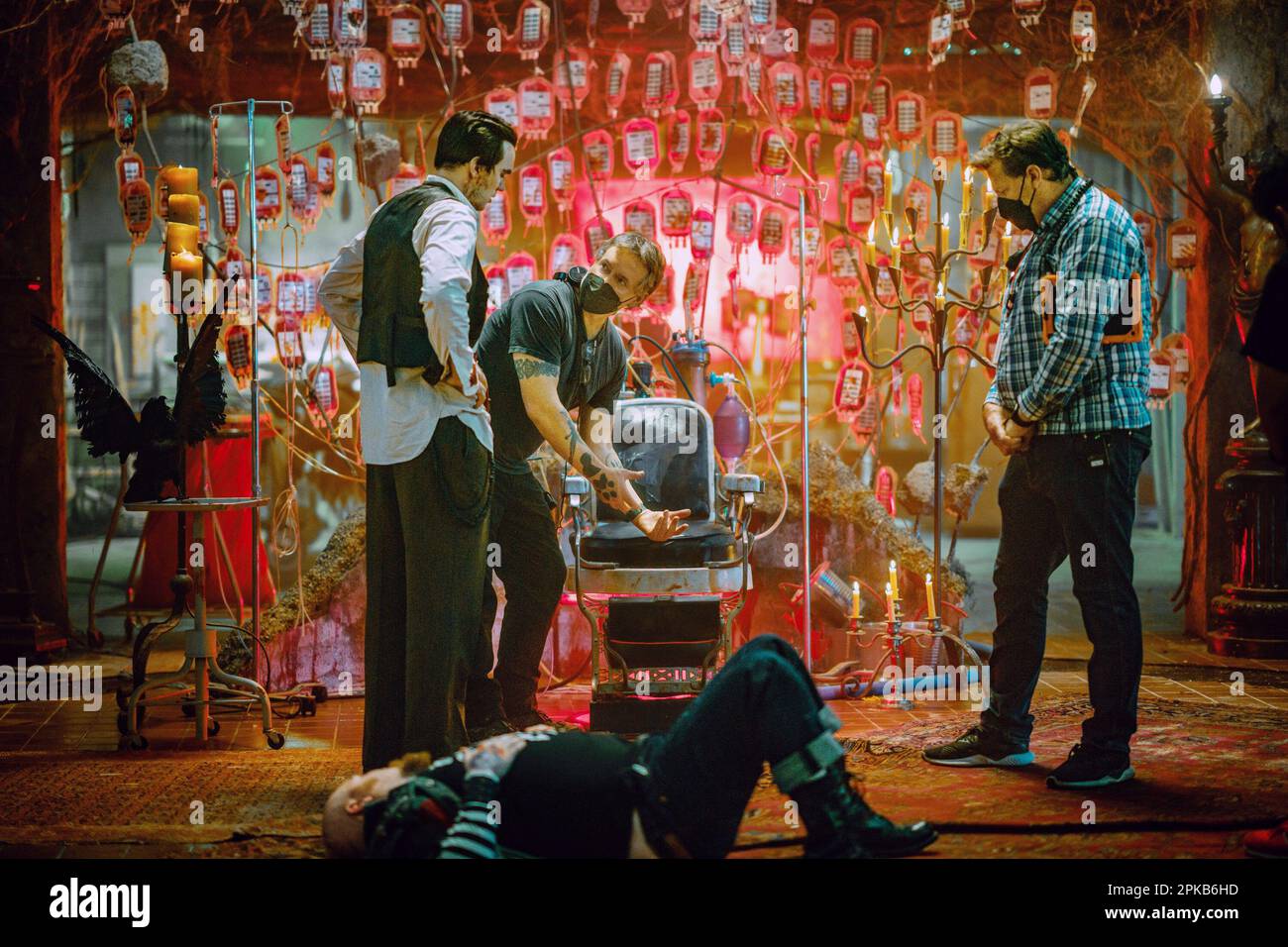 RENFIELD, Nicholas Hoult (left), director Chris McKay (center), on set ...