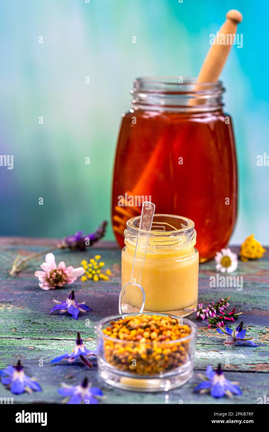 Honey, flower pollen and royal jelly, one behind the other Stock Photo ...