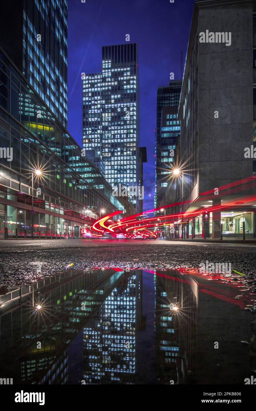 Frankfurt am Main, the city with its illuminated streets and skyline at ...