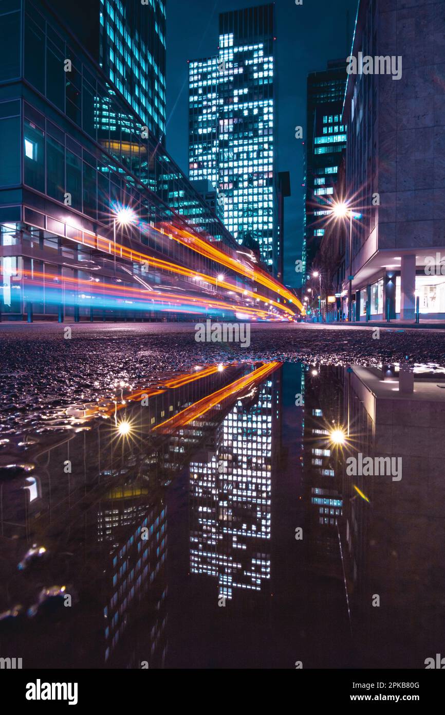 Frankfurt am Main, the city with its illuminated streets and skyline at ...