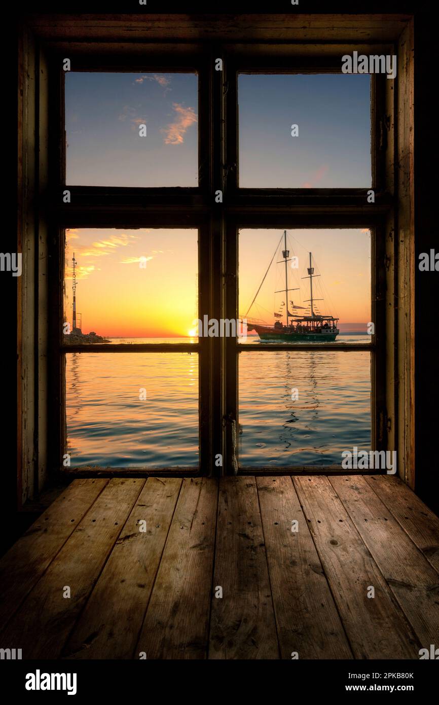 View from a wooden window on the Balaton / Lake Balaton, sailing ship ...
