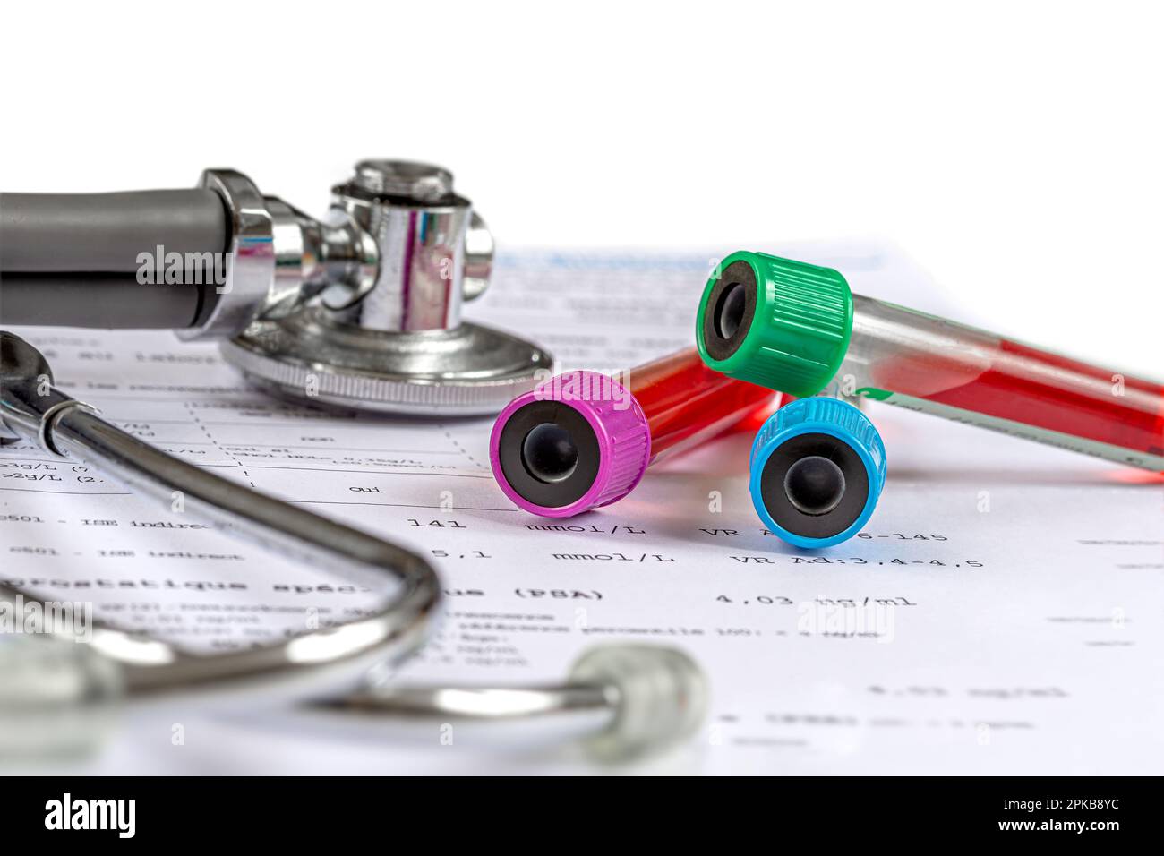 Blood tubes and stetoscope placed on test results Stock Photo - Alamy