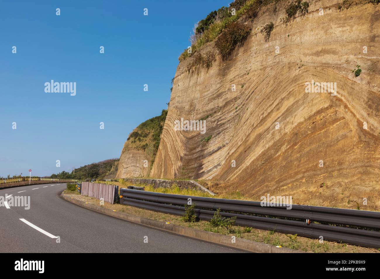 Japan, Honshu, Izu-Oshima Island, Road and Stratum Section of Cliffs ...