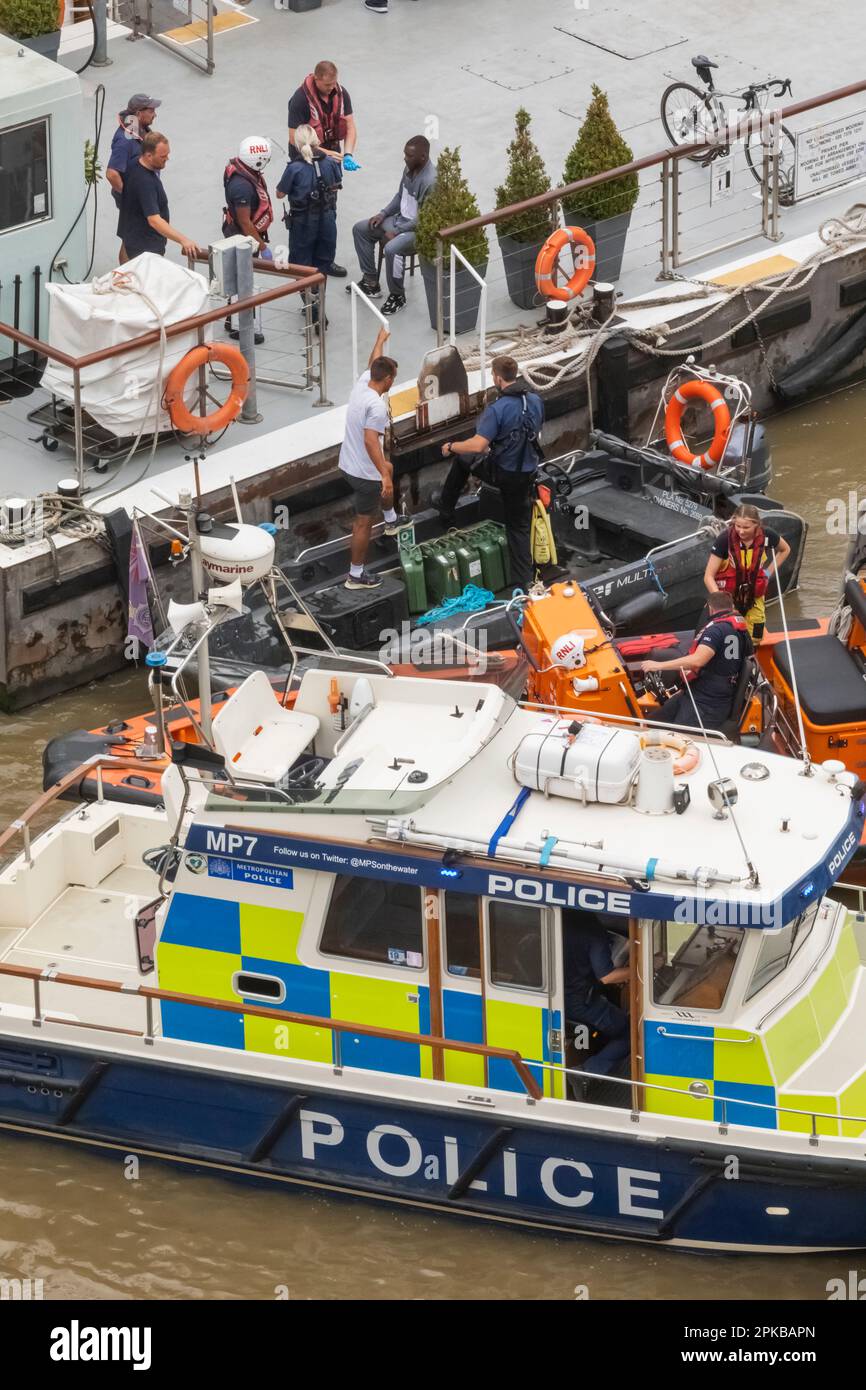 England, London, River Thames, Man Being Rescued from River Stock Photo ...