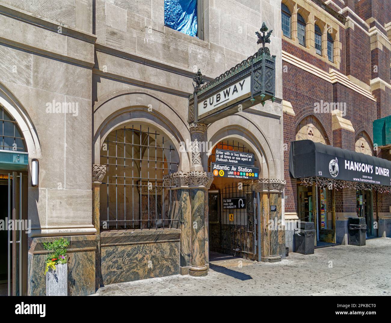 Williamsburgh Savings Bank’s limestone base is richly carved with ...