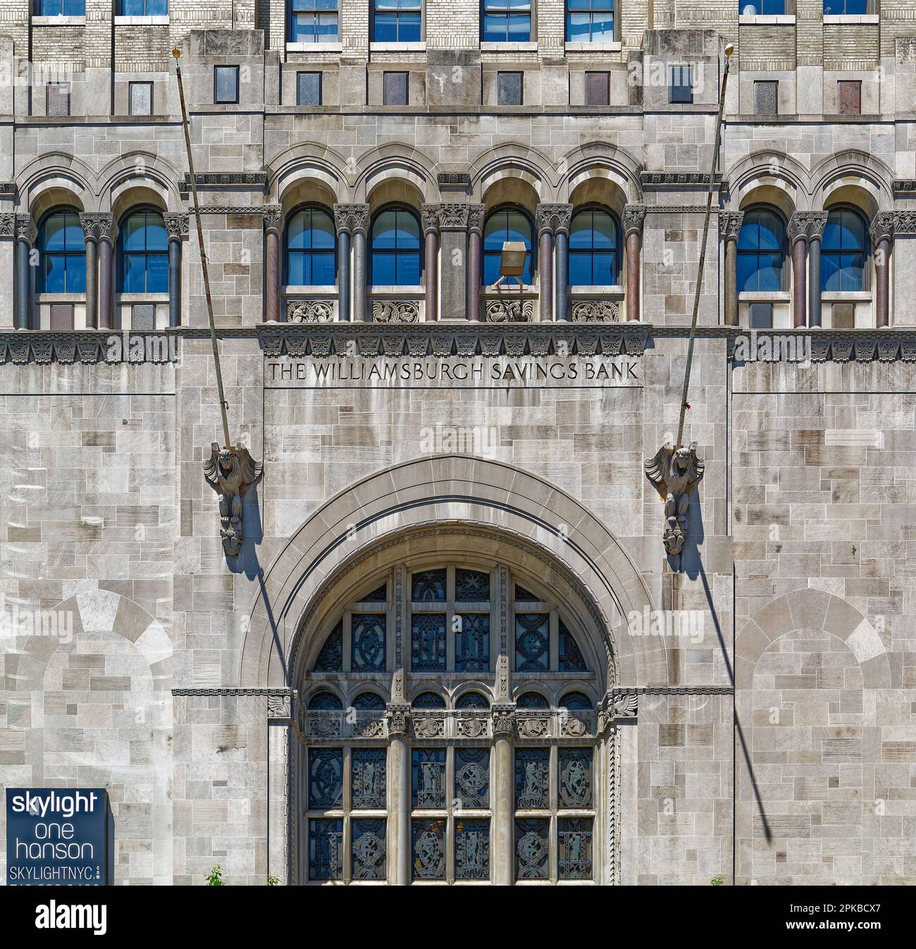 Williamsburgh Savings Bank’s limestone base is richly carved with ...
