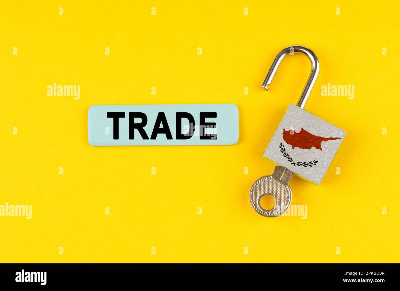 On a yellow surface, an open lock with the image of the flag of Cyprus ...
