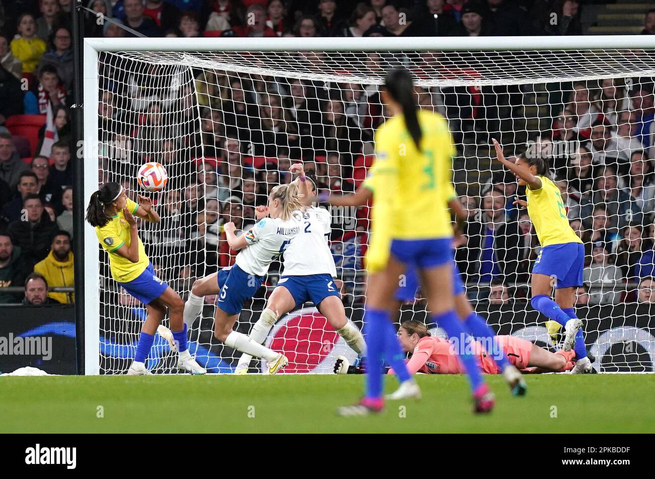 Brazil's Andressa Alves (left) scores their side's first goal of the ...