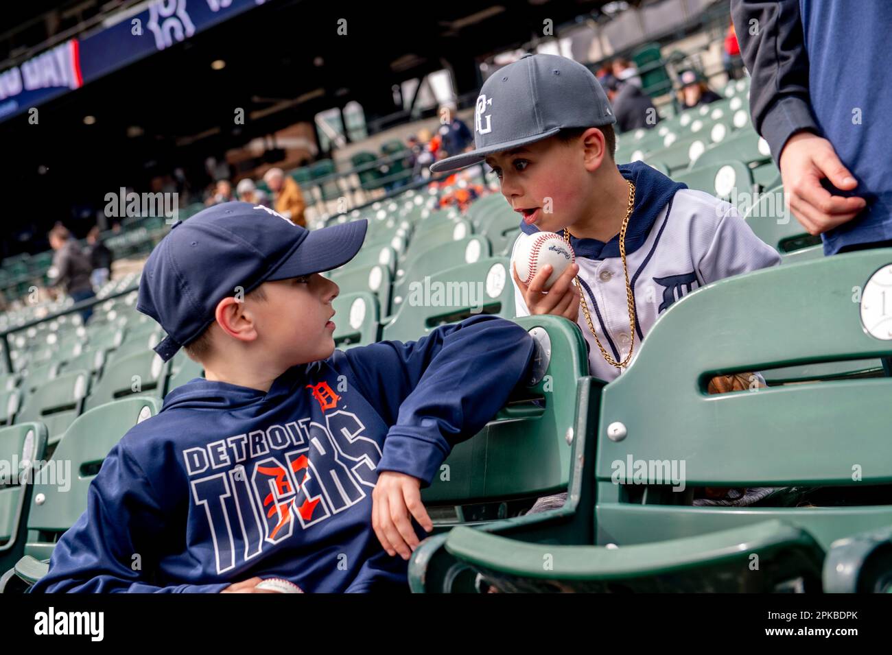 Owen Post, 9 right, gives a game ball to Cameron Herrick, 6, after ...
