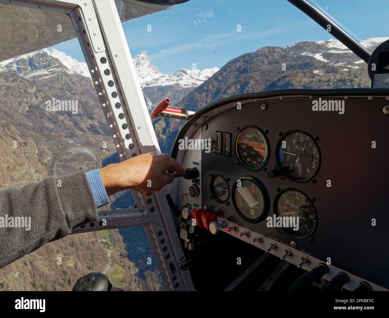 View from a cockpit of a light aircraft flight towards the Matterhorn ...